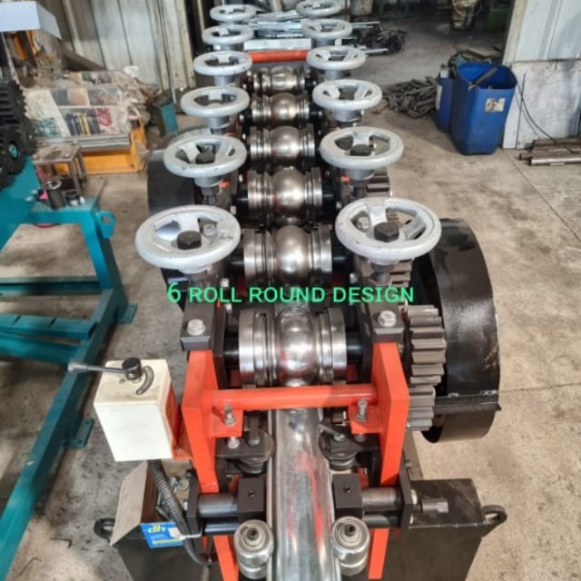 rolling shutter machine 6 roll single design machine in Pune - Digambar Engineering Works