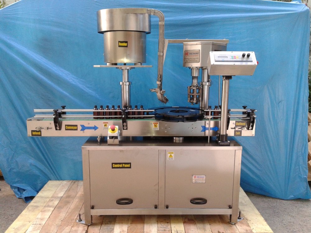 SS AUTOMATIC SINGLE/ FOUR HEAD BOTTLE SCREW CAPPING MACHINE, 500 KG, Production Capacity: 2400 ...